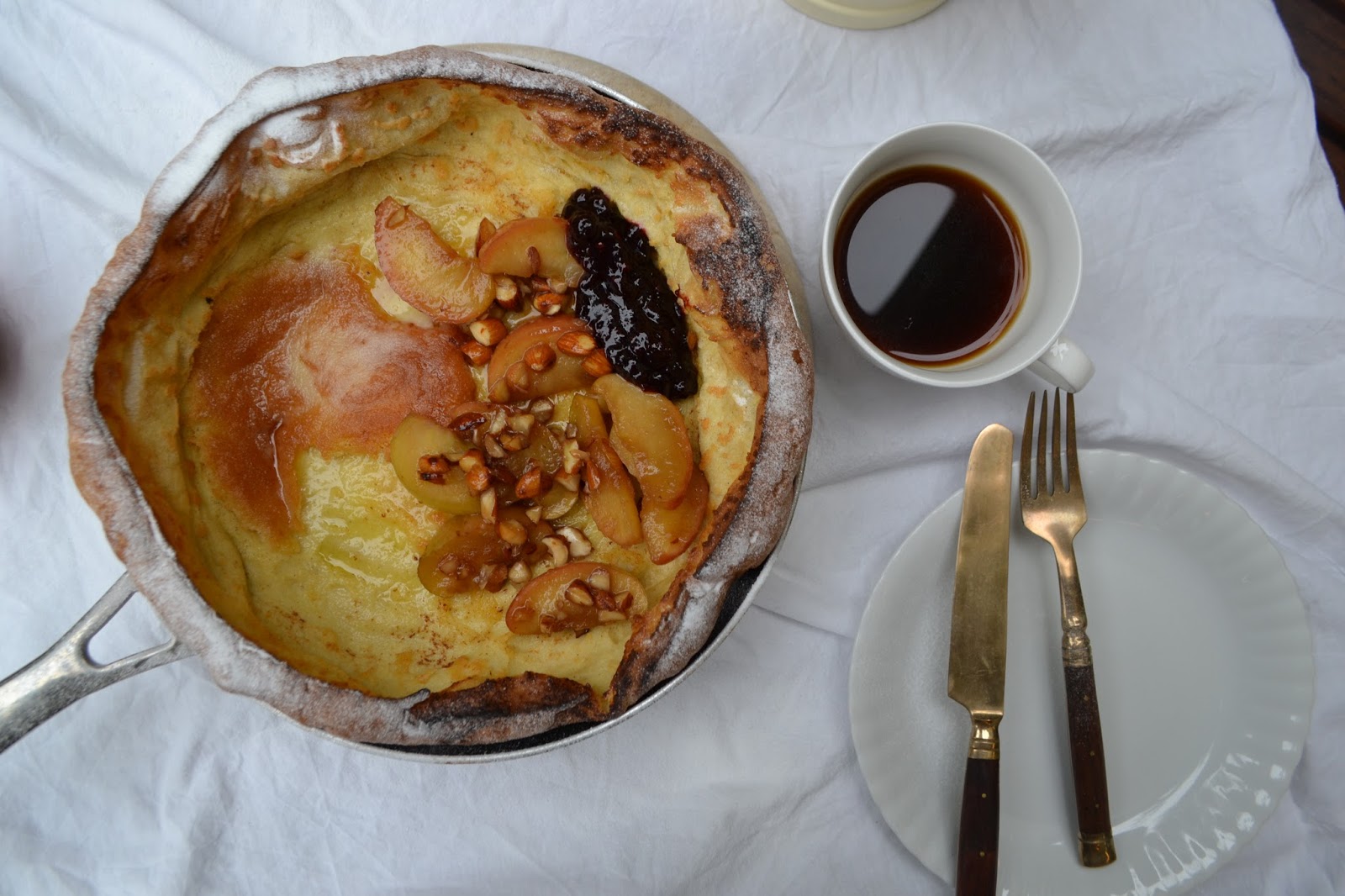 Dutch Baby Pancake with Maple Syrup Glazed Apples - Brussels Express