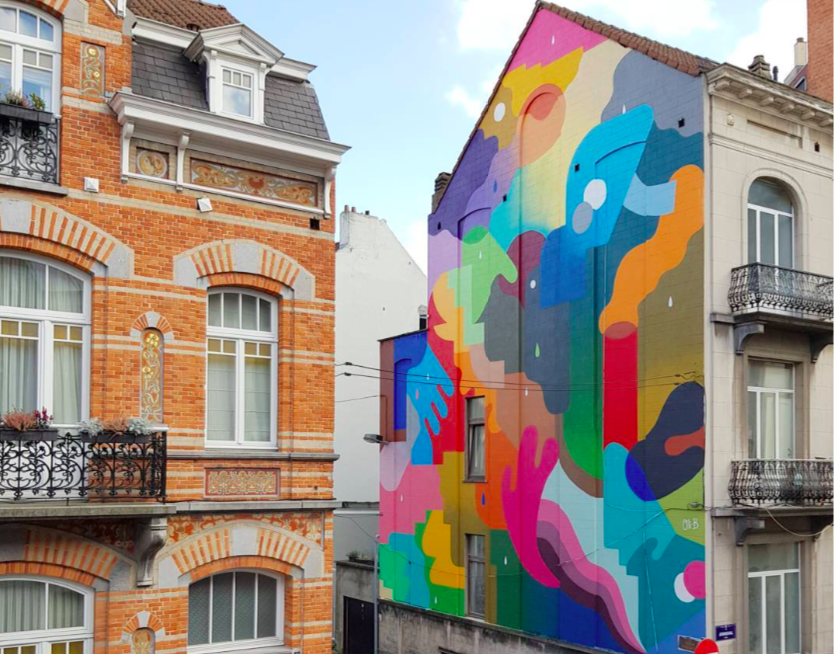 First street art wall at Squares neighbourhood - Brussels Express